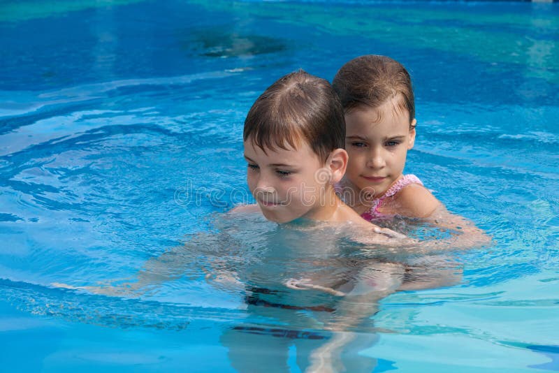 Brother Sister Swim Play in Pool Stock Photo - Image of blue, energy ...