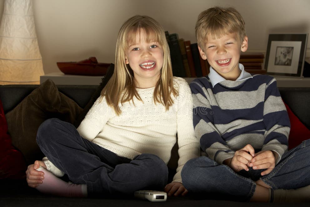 Brother and Sister Watching Television Stock Photo - Image of excited ...