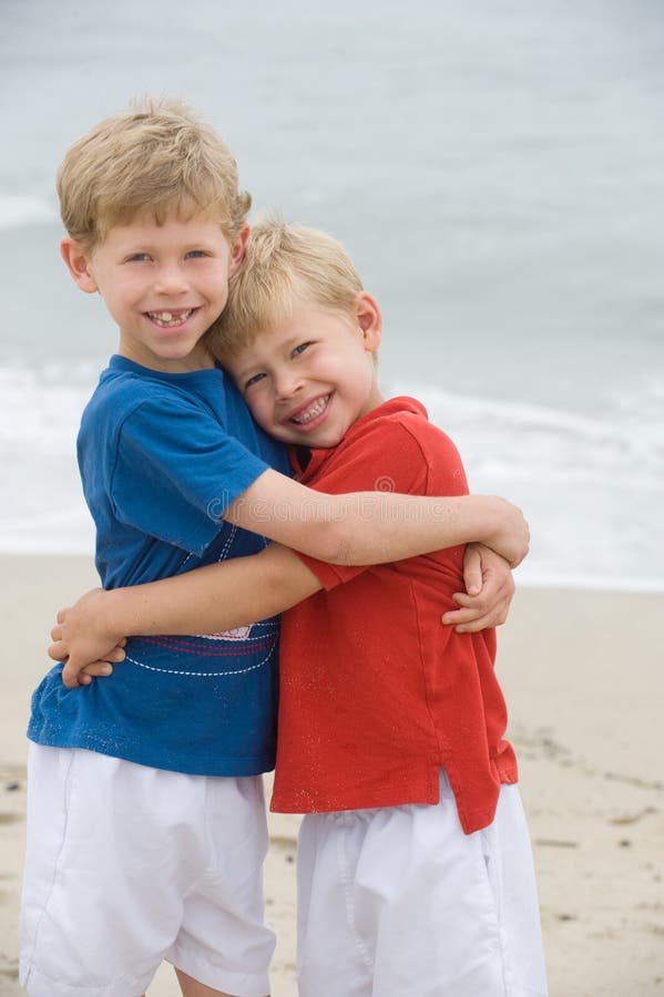 Brotherly love stock photo. Image of children, sand, pals - 7426108