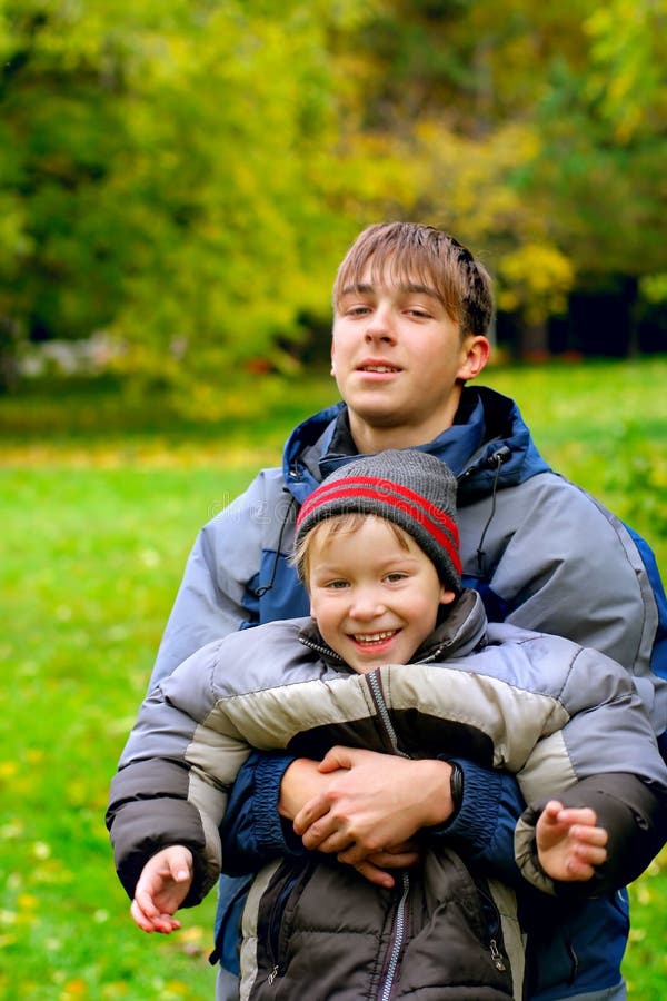 Brothers stock image. Image of embrace, confidence, fall - 6864293