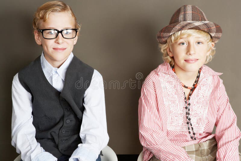 Brothers on Brown Background Stock Photo - Image of indoors, happy ...