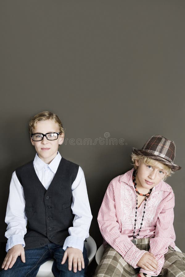 Brothers on Brown Background Stock Photo - Image of blue, indoors: 28832928