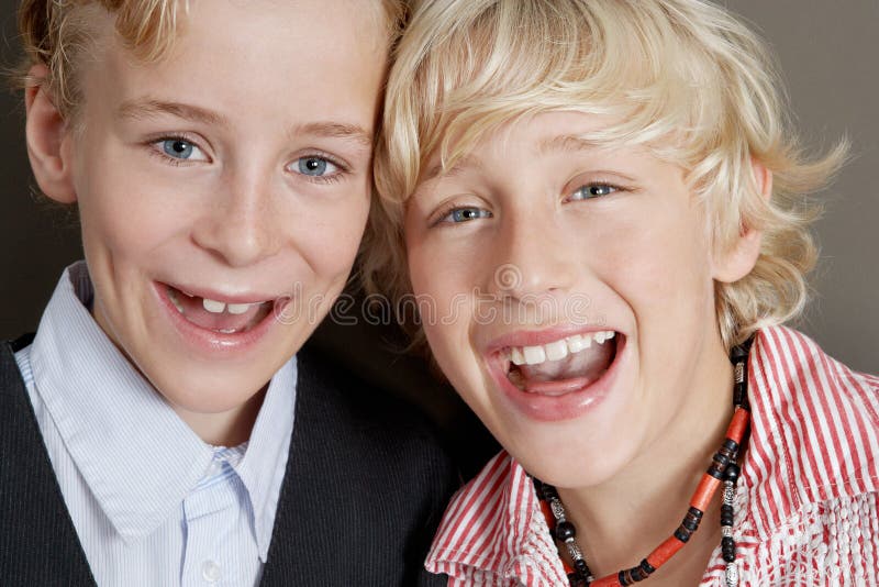 Brothers on Brown Background Stock Photo - Image of indoors, happy ...