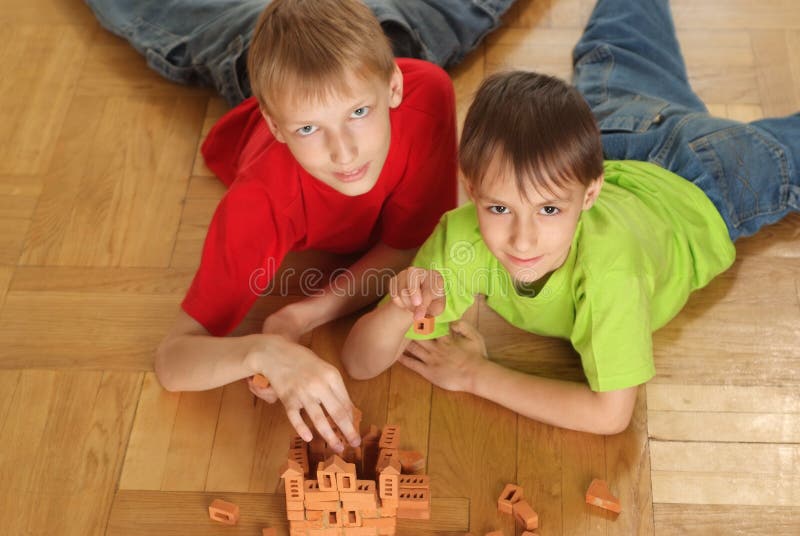 Two brothers are building stock image. Image of friendship - 15181565