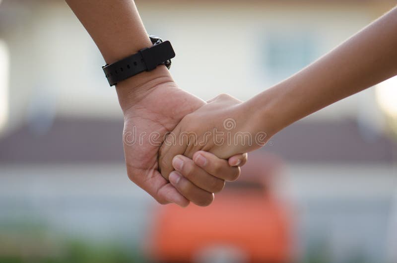 Brothers Holding Hands Went Ahead with Concern and Ties. Happy Stock ...