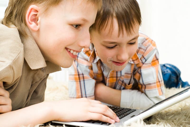 Brothers with laptop stock image. Image of friendship - 14165111