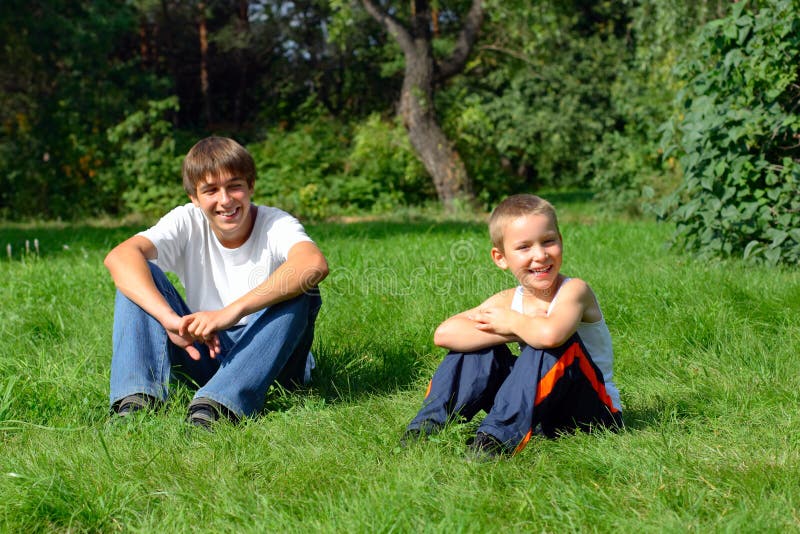 Brothers in the Park stock photo. Image of smile, attractive - 28604124