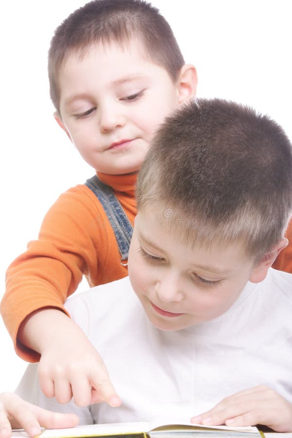 Two brothers with book stock photo. Image of support - 11306772