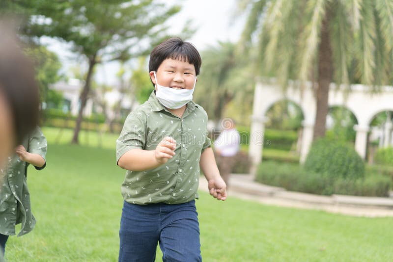 3 Brothers are Running and Playing in the Garden Stock Photo - Image of ...