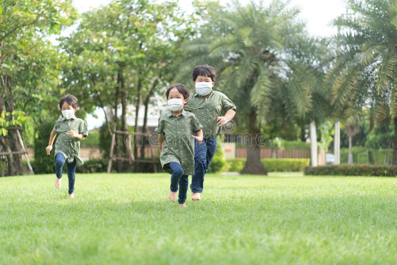 3 Brothers are Running and Playing in the Garden Stock Photo - Image of ...