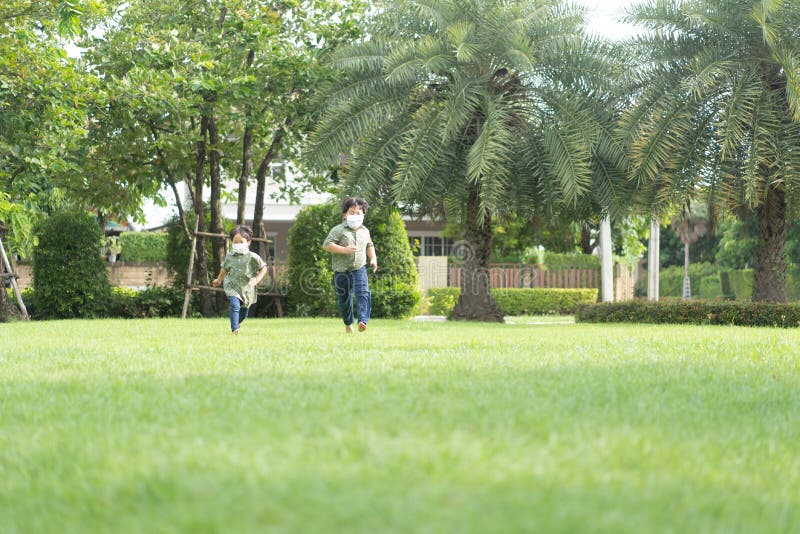 3 Brothers are Running and Playing in the Garden Stock Image - Image of ...