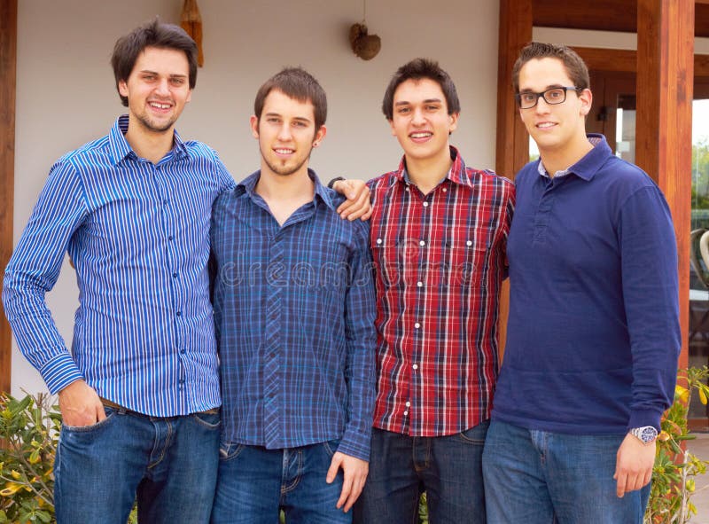 Brothers Standing Together. Portrait of a Group of Young Men Standing ...