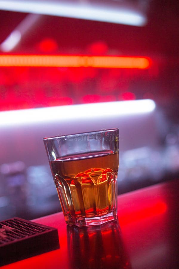 Brown alcoholic cocktail stock image. Image of portion - 70119391