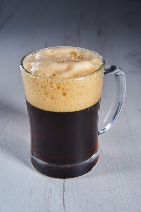 Brown ale in a mug stock image. Image of liquid, craft - 266261073