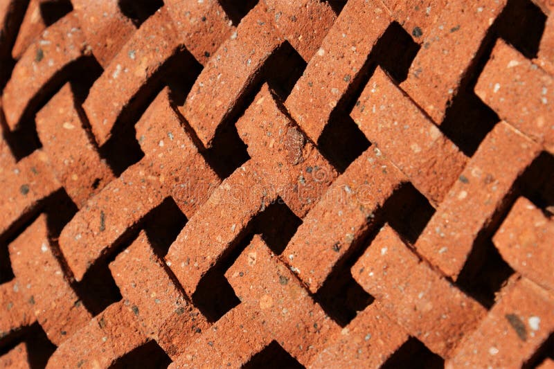 Brown Background. the Structure of the Braid is Carved into the Stone ...
