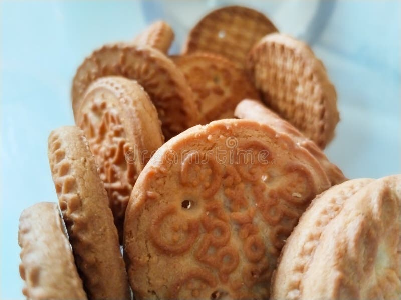 Brown biscuits stock photo. Image of cookie, eating - 342890474