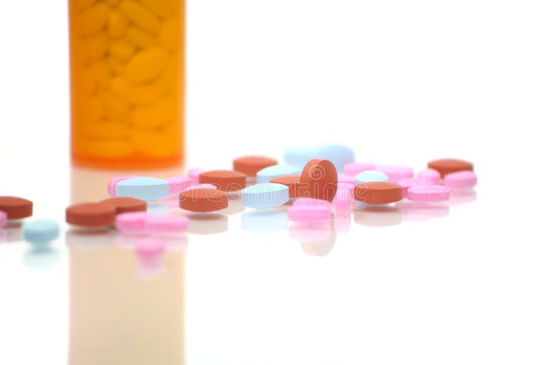 Brown, Blue, and Pink Pills with Bottle Stock Image - Image of ...