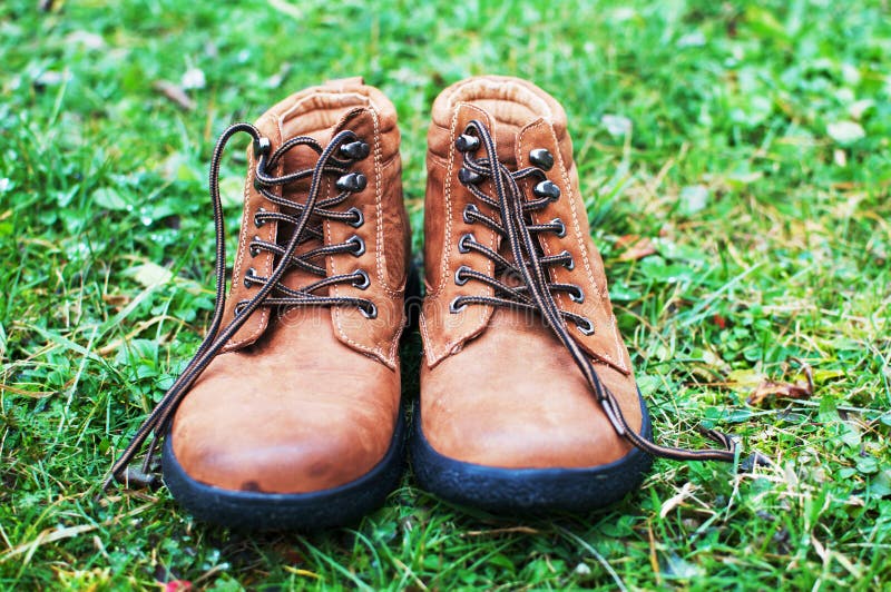 Brown boots stock image. Image of meadow, grass, male - 37456293