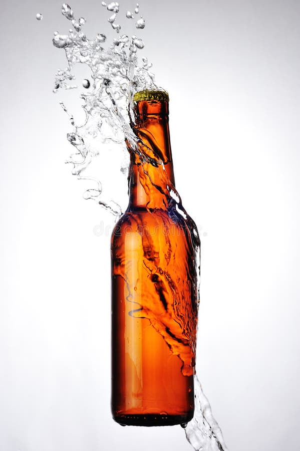 Beer Bottle with Water Splash Stock Photo - Image of gold, macro: 24437234