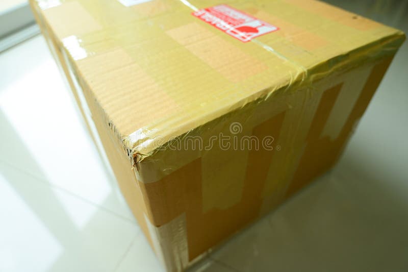 Brown Box Packaging with Warning Symbol Stock Image - Image of package ...