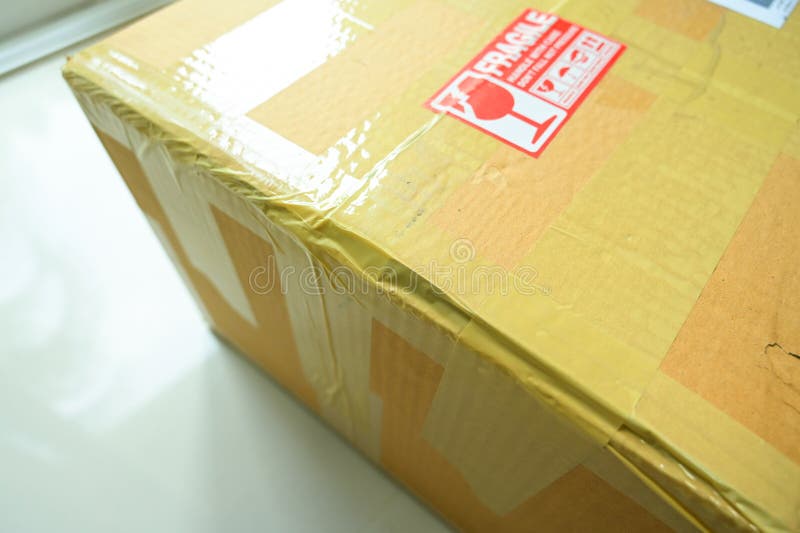 Brown Box Packaging with Warning Symbol Stock Image - Image of fragile ...