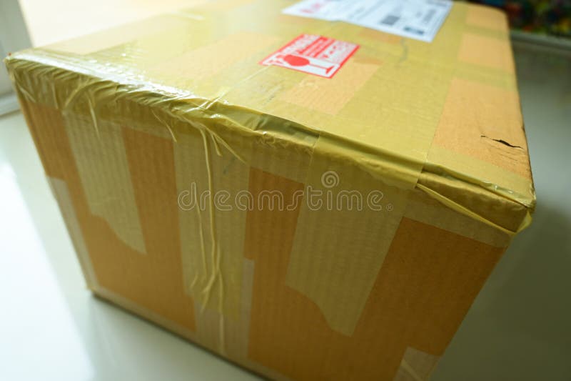 Brown Box Packaging with Warning Symbol Stock Image - Image of blank ...