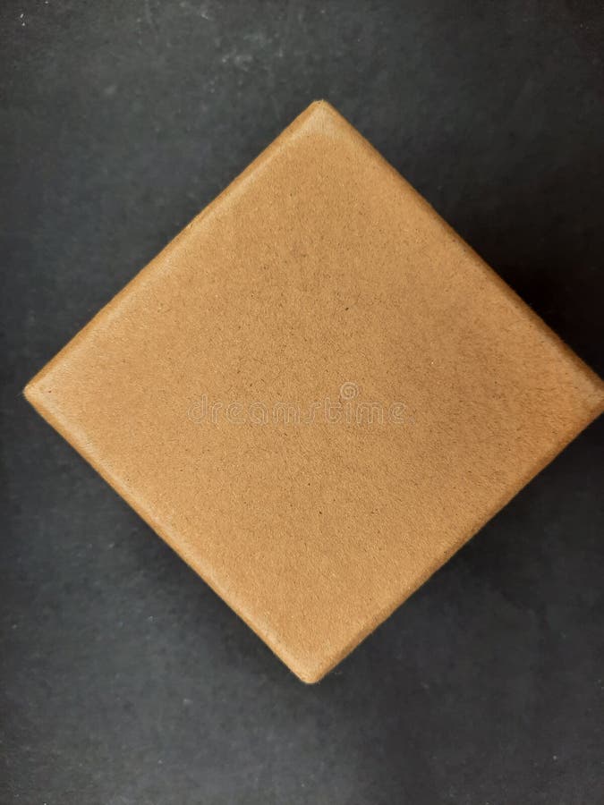 Brown Box Top View Closeup Isolated on Black Background Stock Photo ...