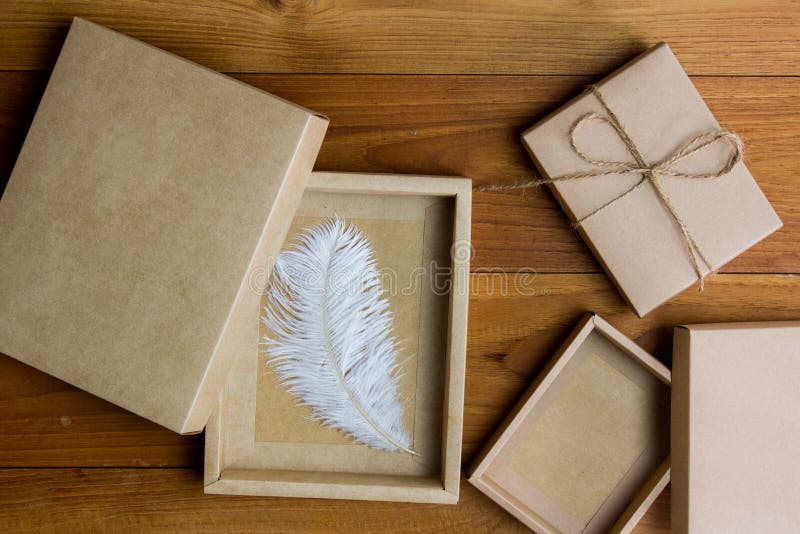 Brown Boxes with Father Over the Wooden Table. Stock Photo - Image of ...