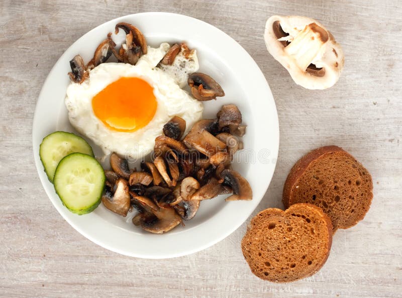 Brown Bread, Cucumbe, Fried Eggs and Champignons Stock Photo - Image of ...