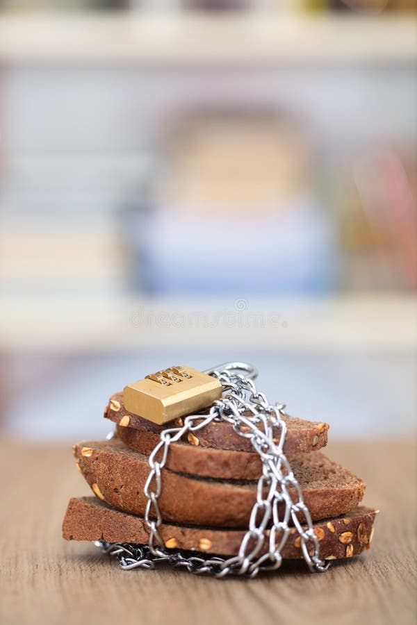 Brown Bread Locked by Chains Stock Image - Image of livelihood, coins ...