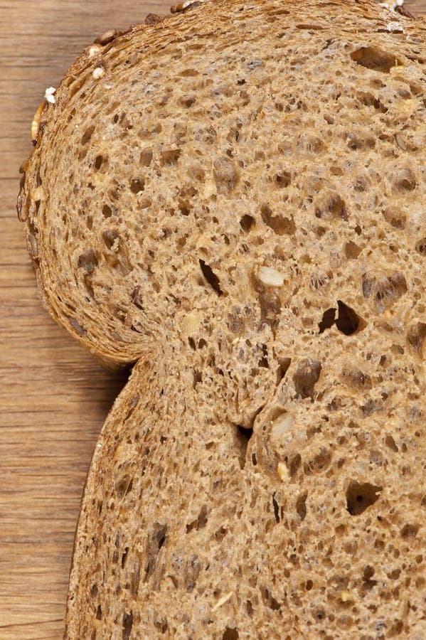 Brown bread slice stock image. Image of wheat, textured - 19903895
