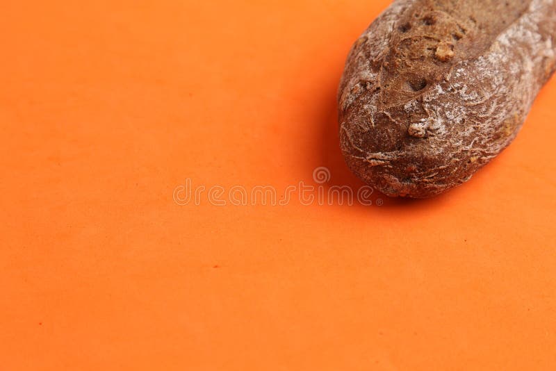 Brown Bread with Walnut Isolated on an Orange Background Stock Photo ...