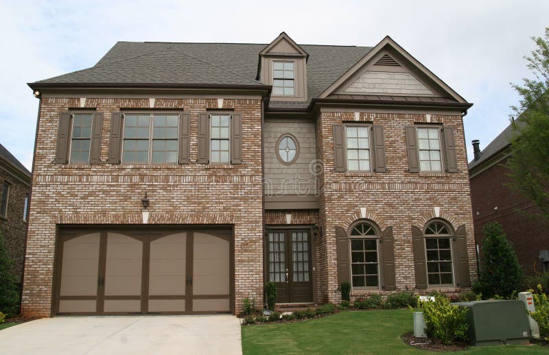 Brown Brick Two Story stock image. Image of landscaping - 2898891