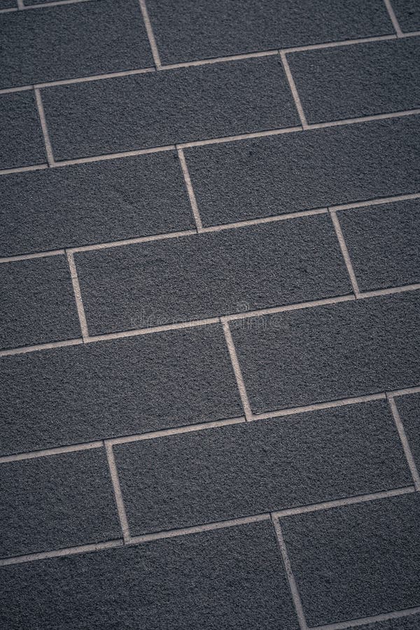 Brown brick wall closeup stock photo. Image of pattern - 77017468