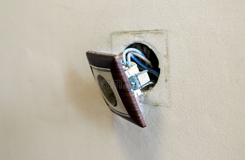 Brown Broken Electrical Socket Fell Out of the Wall. the Socket is Torn ...