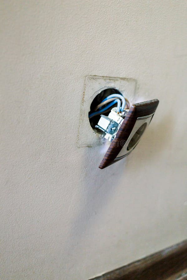 Brown Broken Electrical Socket Fell Out of the Wall. the Socket is Torn ...