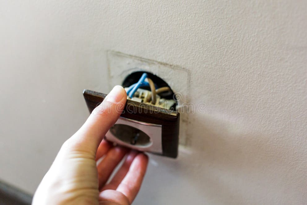 Brown Broken Electrical Socket Fell Out of the Wall. the Socket is Torn ...