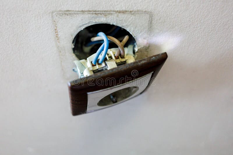 Brown Broken Electrical Socket Fell Out of the Wall. the Socket is Torn ...