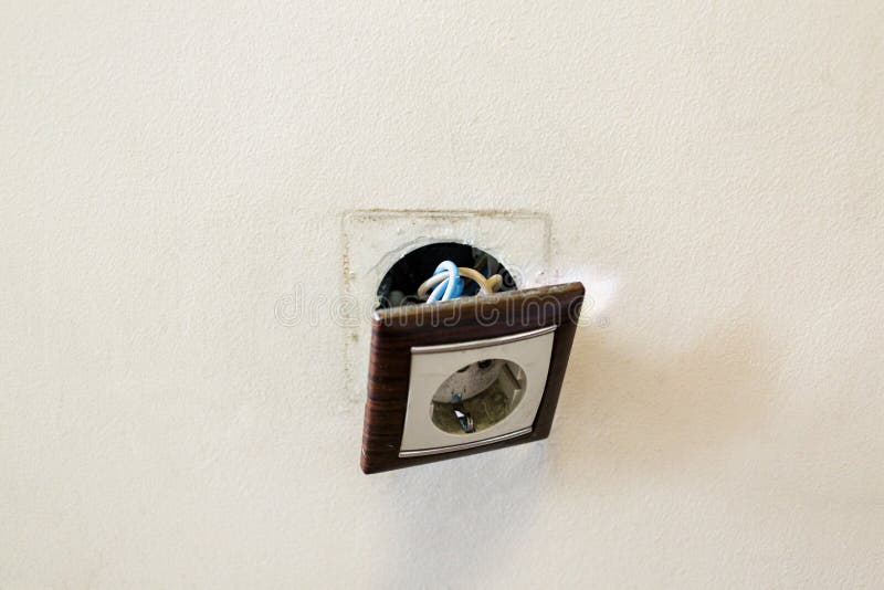 Brown Broken Electrical Socket Fell Out of the Wall. the Socket is Torn ...