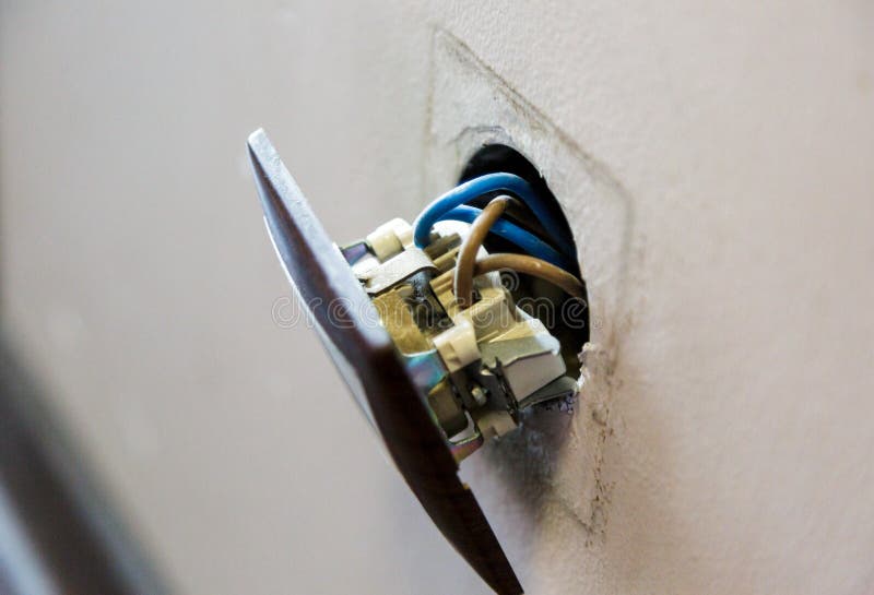 Brown Broken Electrical Socket Fell Out of the Wall. the Socket is Torn ...