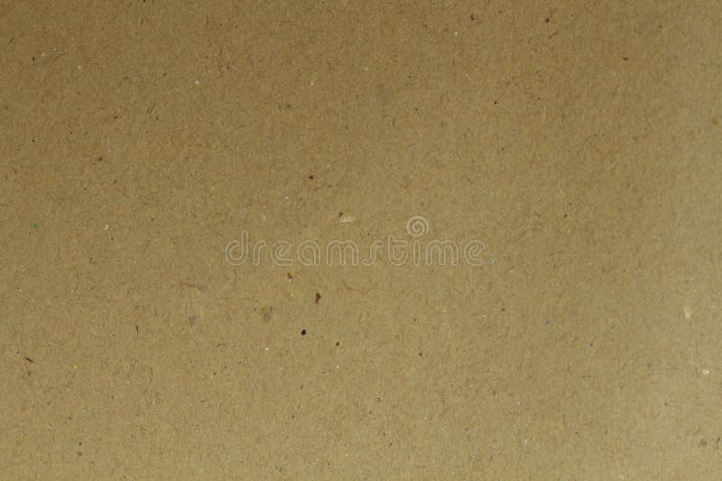 Brown Cardboard with a Coarse Texture, Featuring Small Specks of ...
