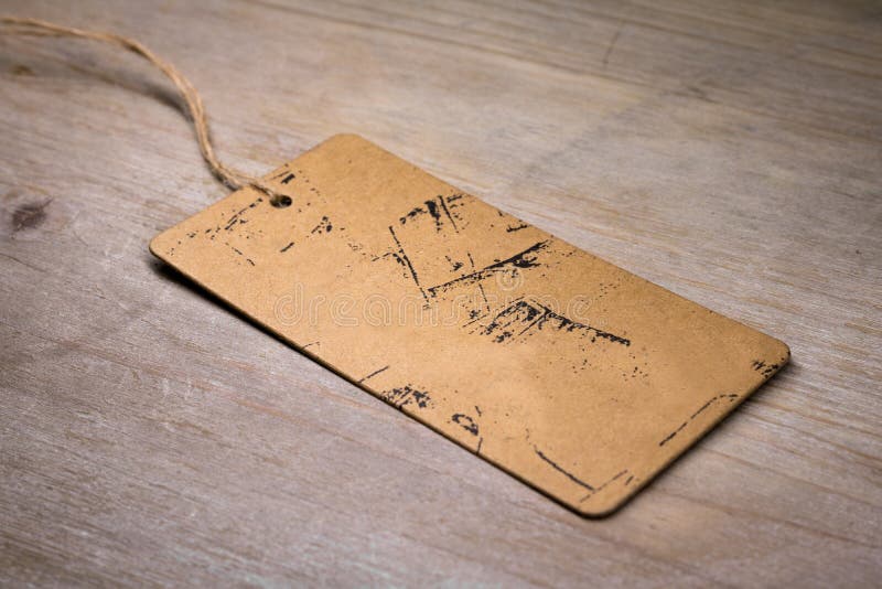 Brown Cardboard Label on Wooden Table. Blank Tag for Your Design Stock ...