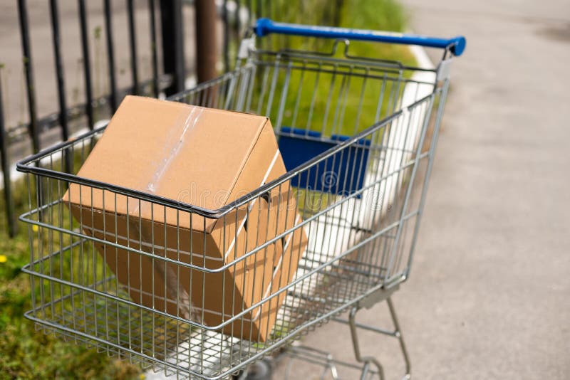 Brown Cardboard Moving Box in the Cart Stock Image - Image of carry ...