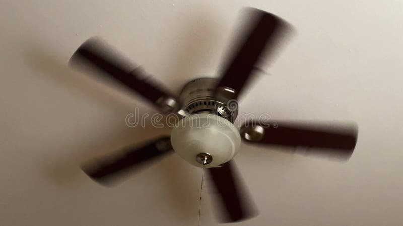 Brown Ceiling Fan Spinning with Vintage Light Dome Stock Footage ...