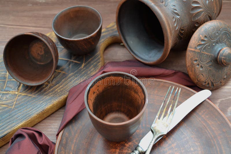 Brown Ceramic Dishware and Wooden Objets in Russian Style Stock Photo ...