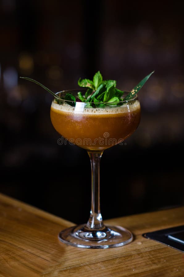 Brown Chocolate Alcoholic Cocktail with Fresh Mint. Cocktail on the ...