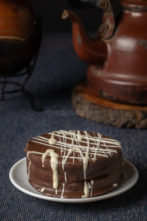 Brown Chocolate Alfajor, Typical Candy in Argentina, with Yerba Mate ...