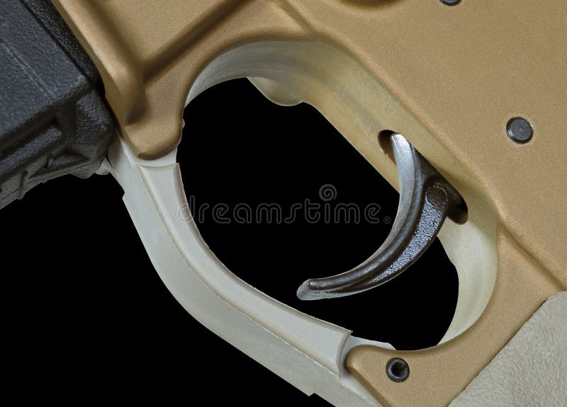 AR-15 trigger on brown stock image. Image of bronze - 136902197