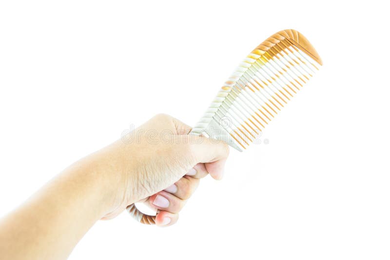Brown Comb in Hand Isolated Stock Image - Image of fashion, hairbrush ...