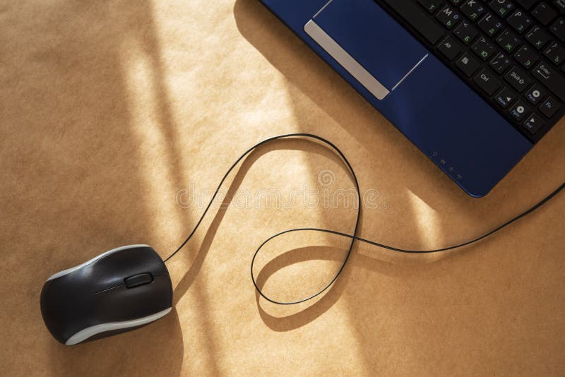 Brown Computer Mouse and Laptop Stock Image - Image of device ...